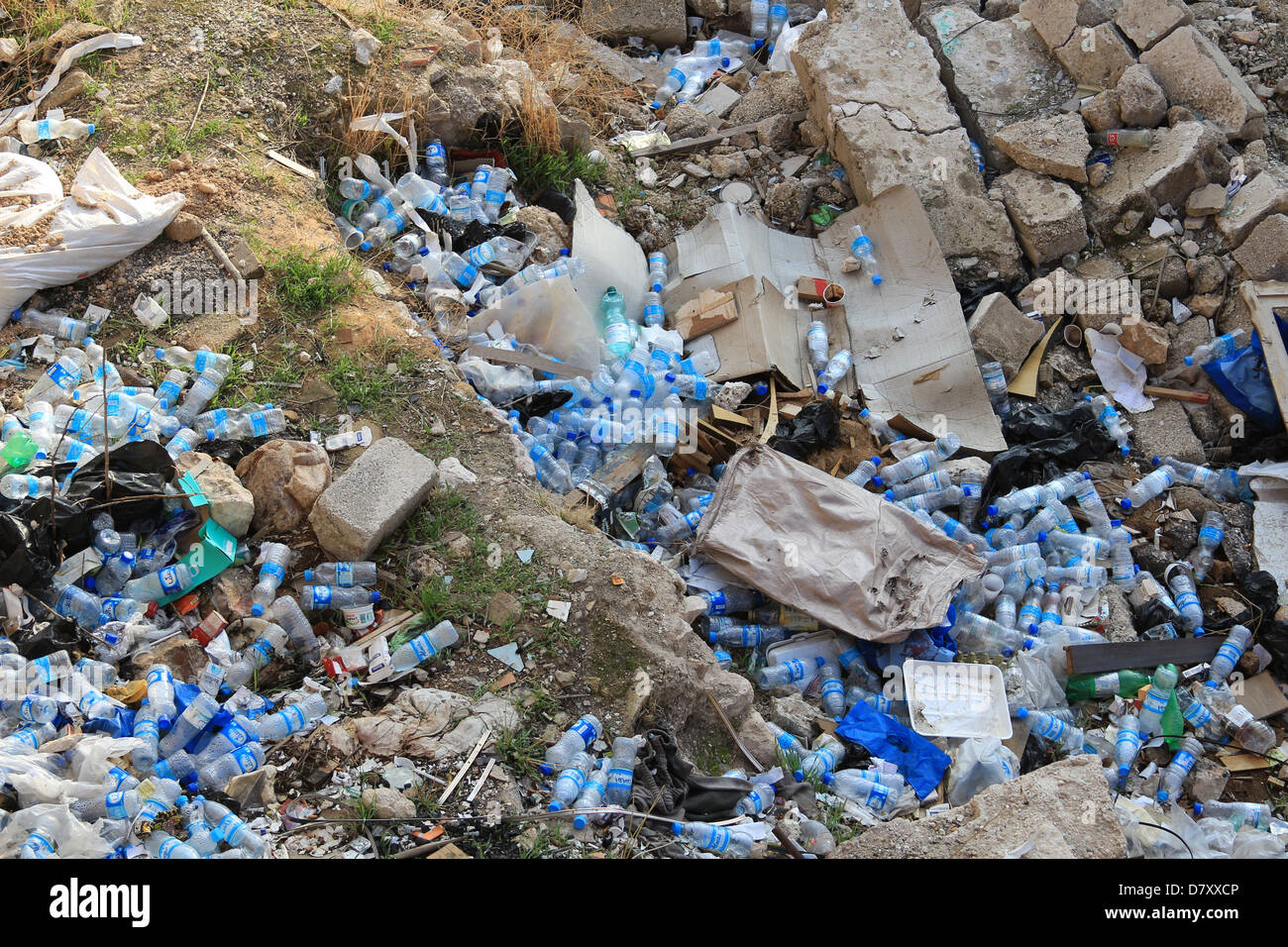 plastic water bottles thrown over a wall near The Citadel in Amman ...