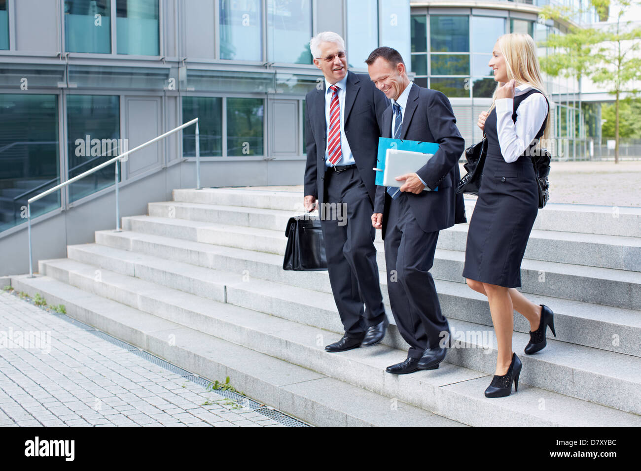 People descending staircase hi-res stock photography and images - Alamy