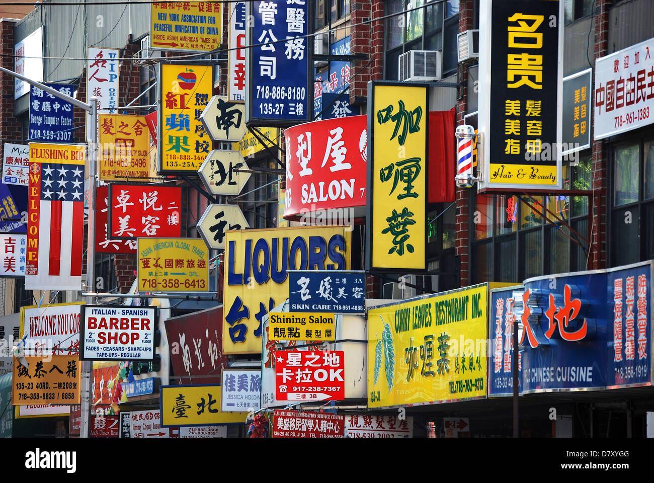 Multitude of street signs in Chinatown, Flushing, Queens, New York ...