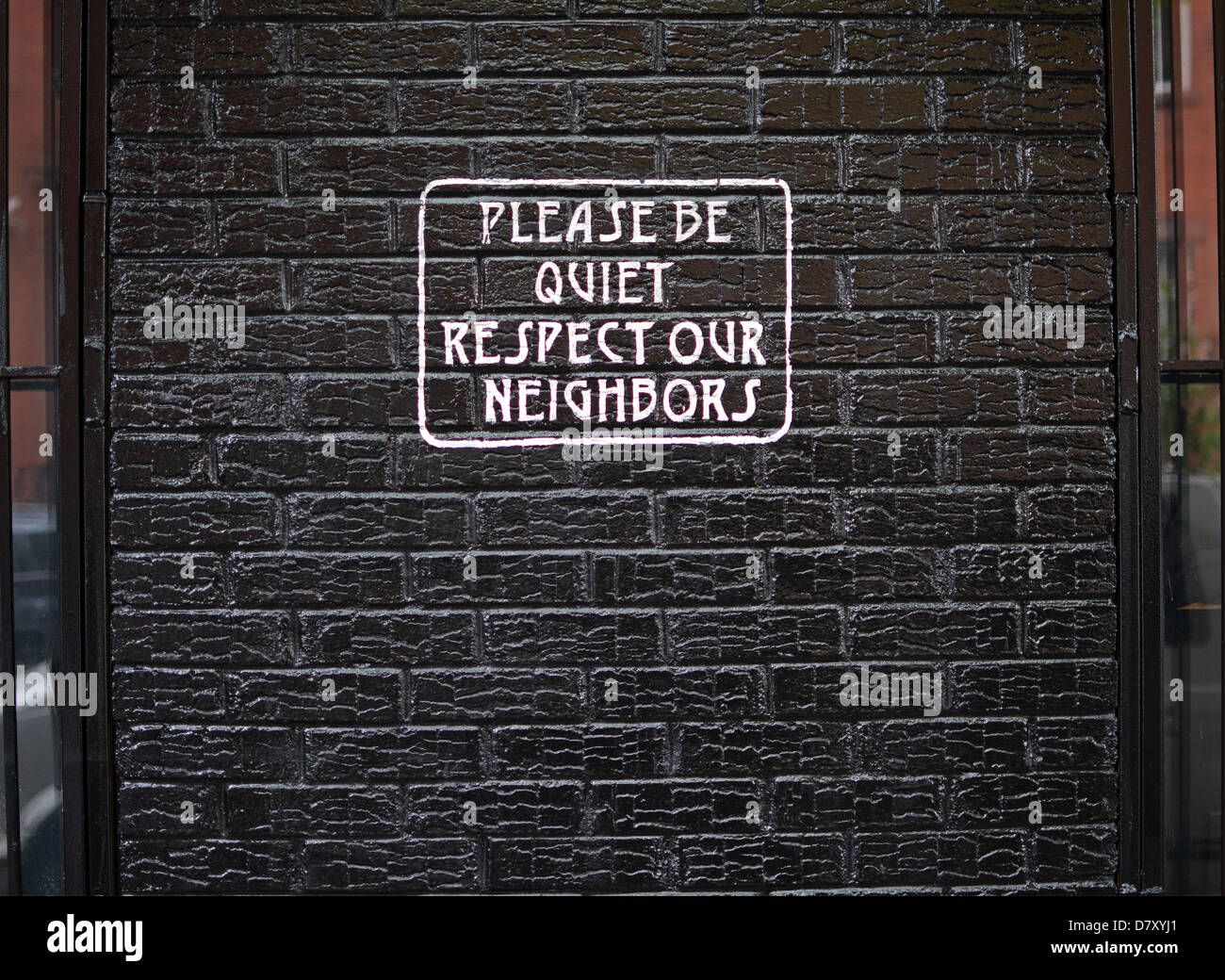 Sign outside Whiskey Town restaurant n Greenwich Village beckoning ...
