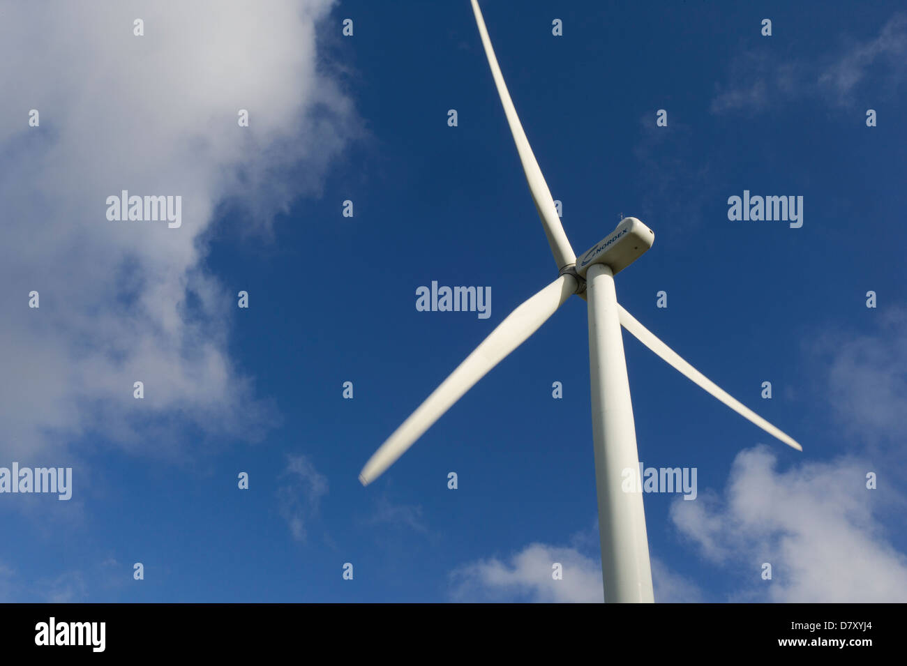 Wind turbine vanes against blue sky and clouds Stock Photo - Alamy