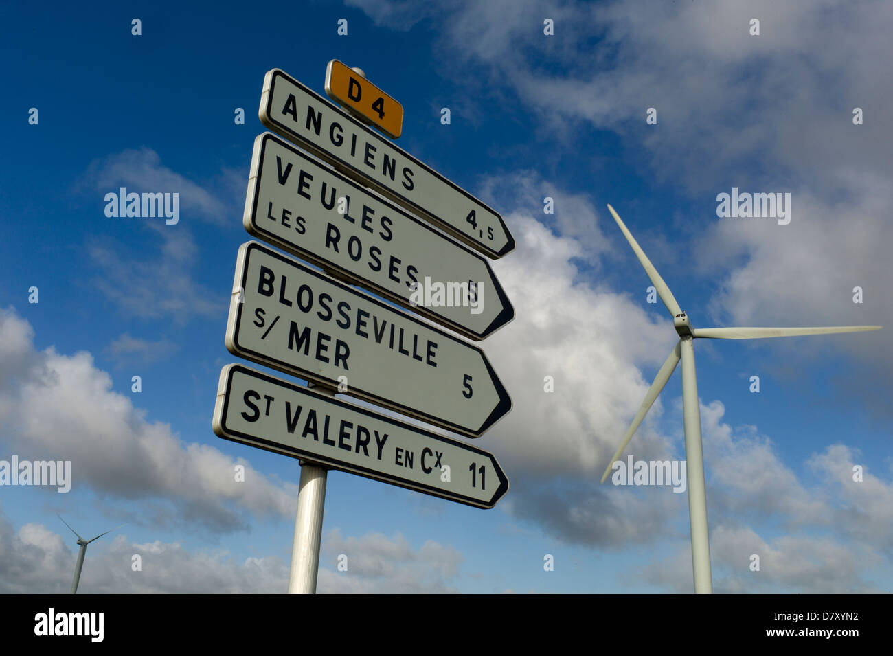 road signs and wind turbine, Normandy, France, blue sky and clouds ...