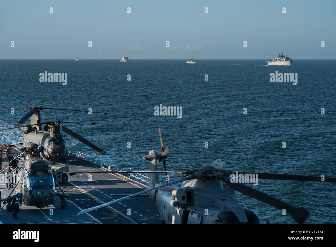 Merlin HM2, RAF Chinook and Royal Navy Sea King on the flight deck of ...