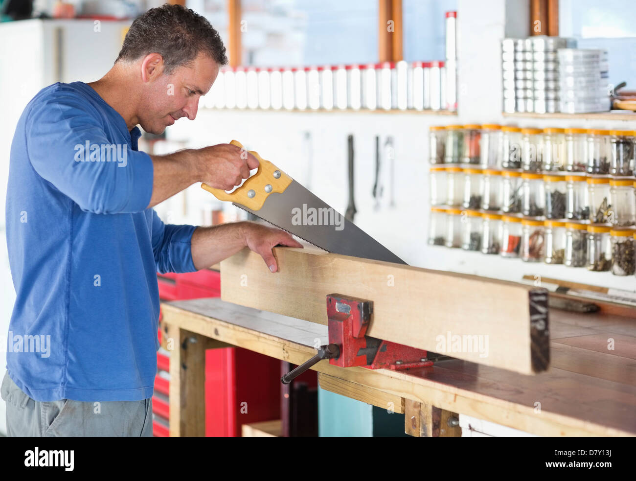 Man working in workshop Stock Photo - Alamy