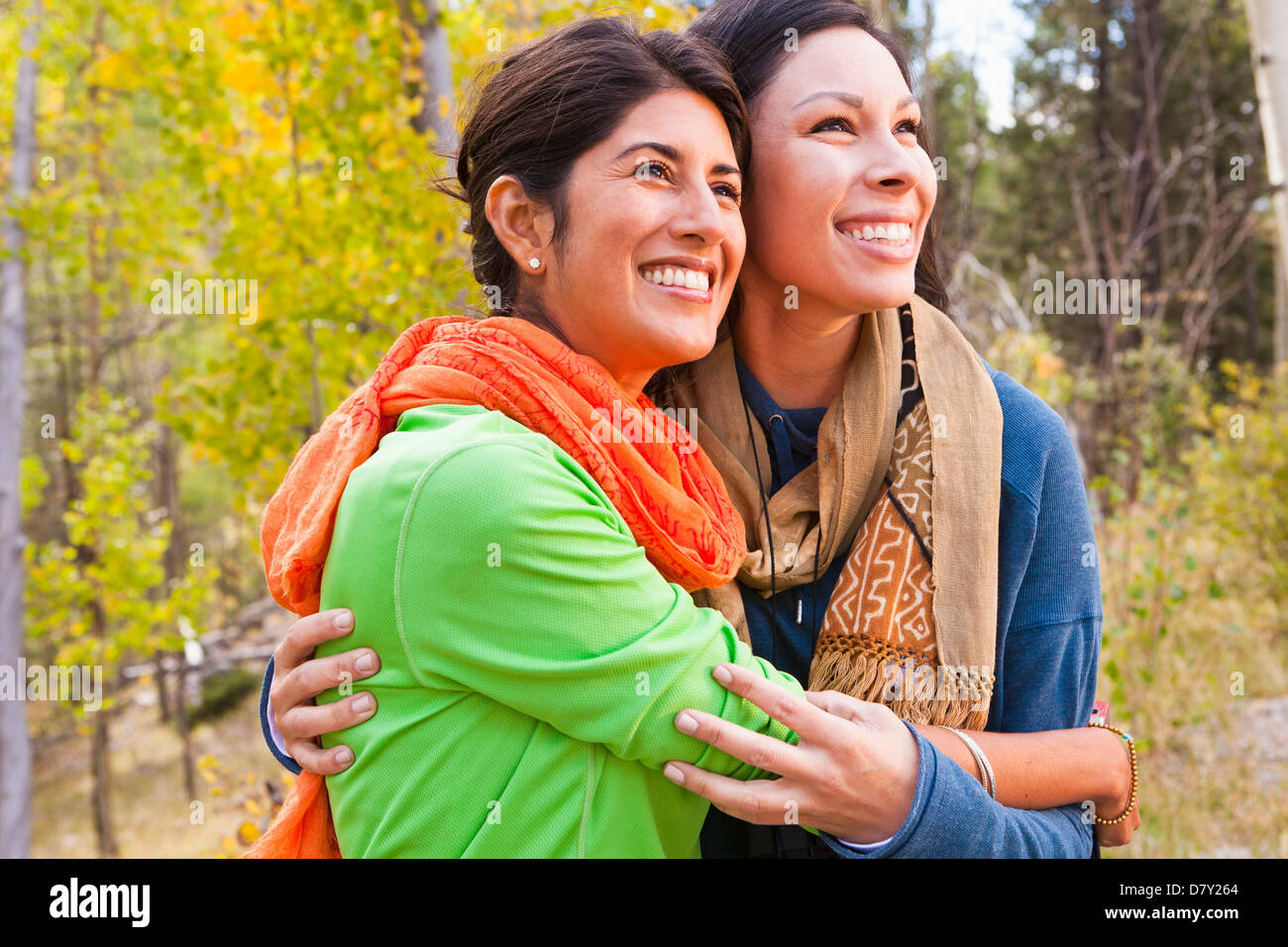Happy latina friends hugging in hi-res stock photography and images - Alamy