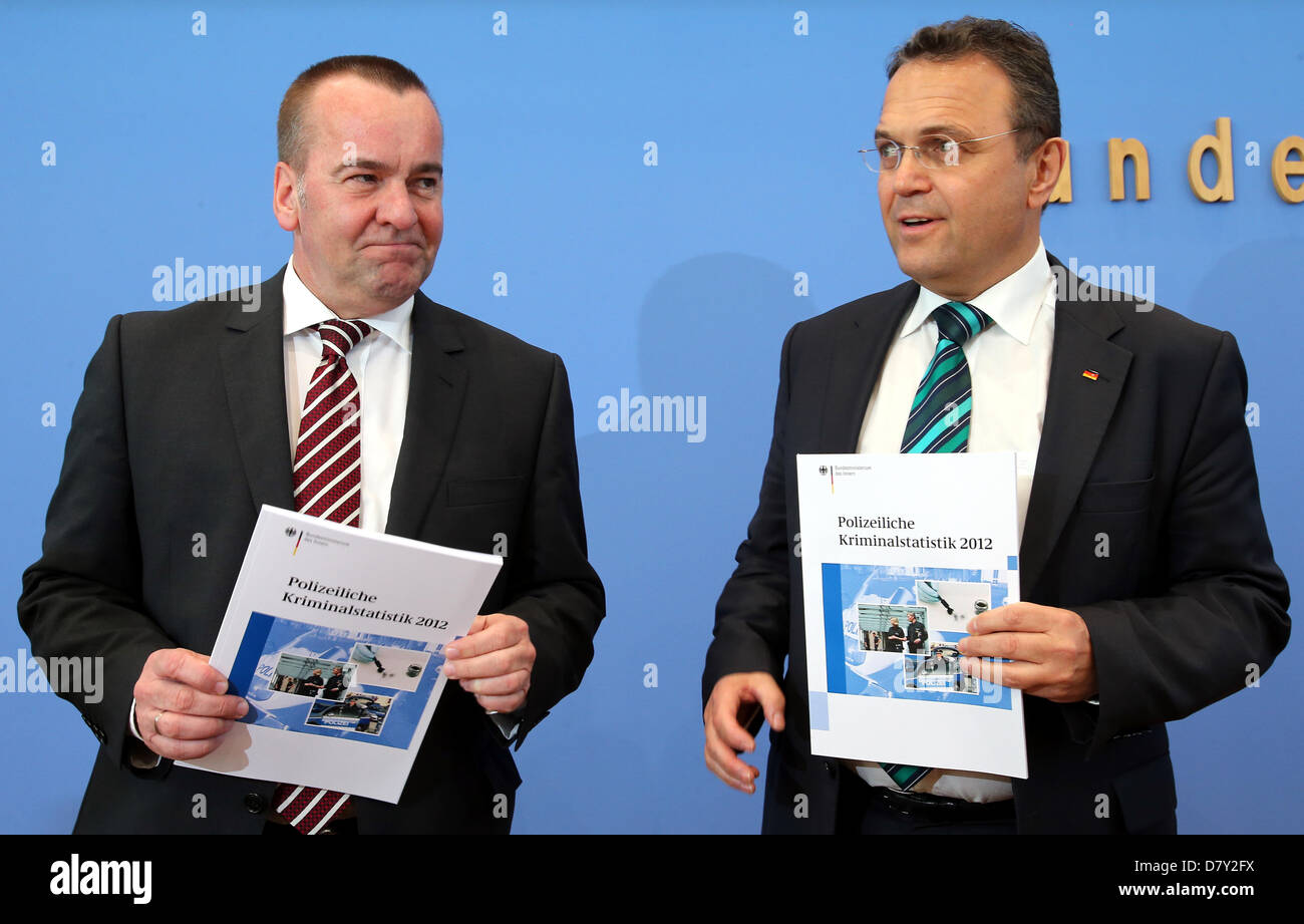 German Interior Minister Hans-Peter Friedrich (R) and Chairman of the ...
