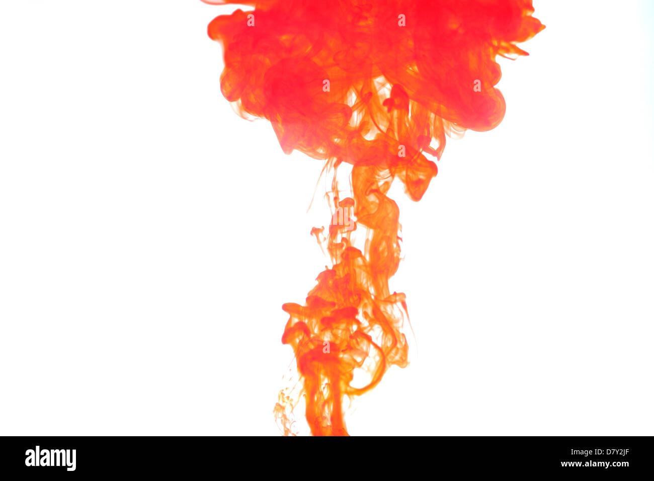 Red Smoke caused by water color Stock Photo - Alamy