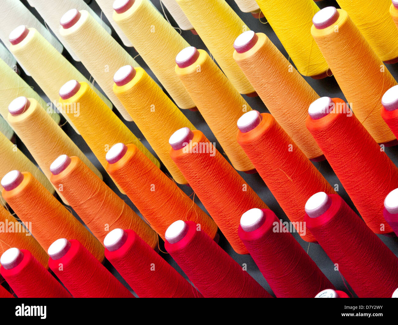 The colorful of the cone threads from textile factory Stock Photo - Alamy