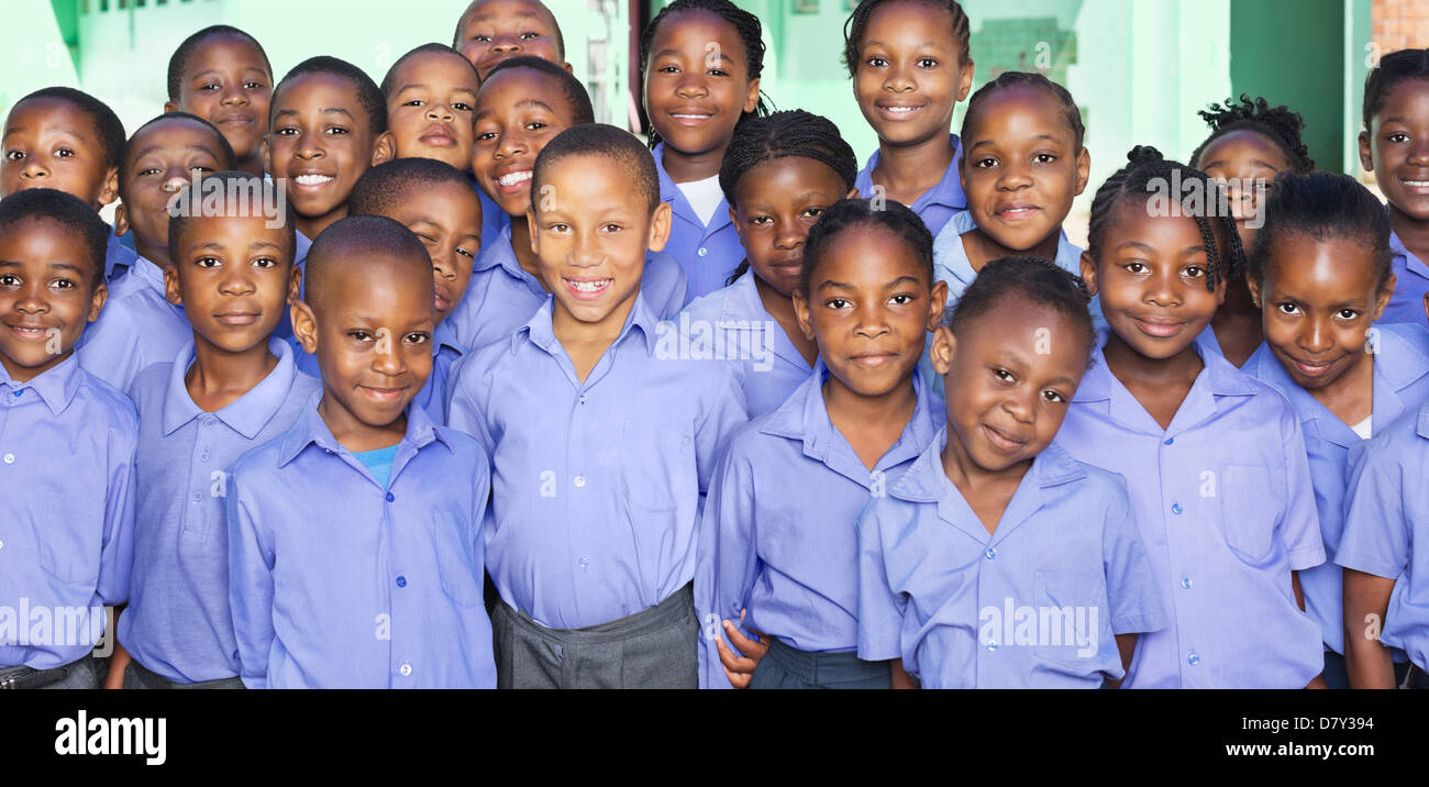 Students smiling together in classroom Stock Photo - Alamy