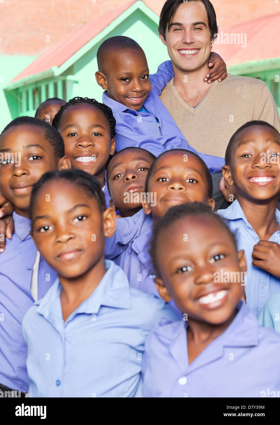 Students and teachers smiling outdoors Stock Photo - Alamy