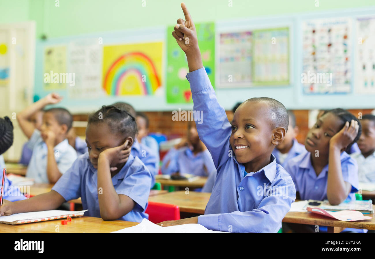 Student raising hand in class Stock Photo: 56529294 - Alamy