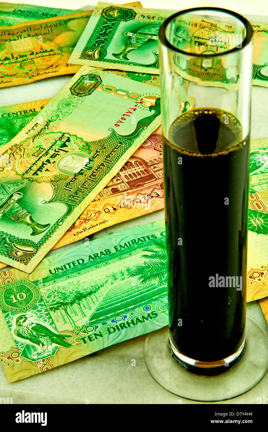 Oil and money Stock Photo - Alamy
