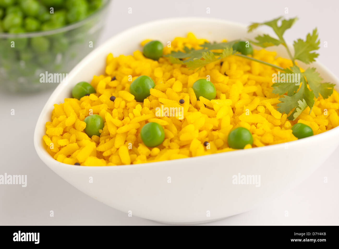 Poha- beaten rice and vegetables Stock Photo - Alamy