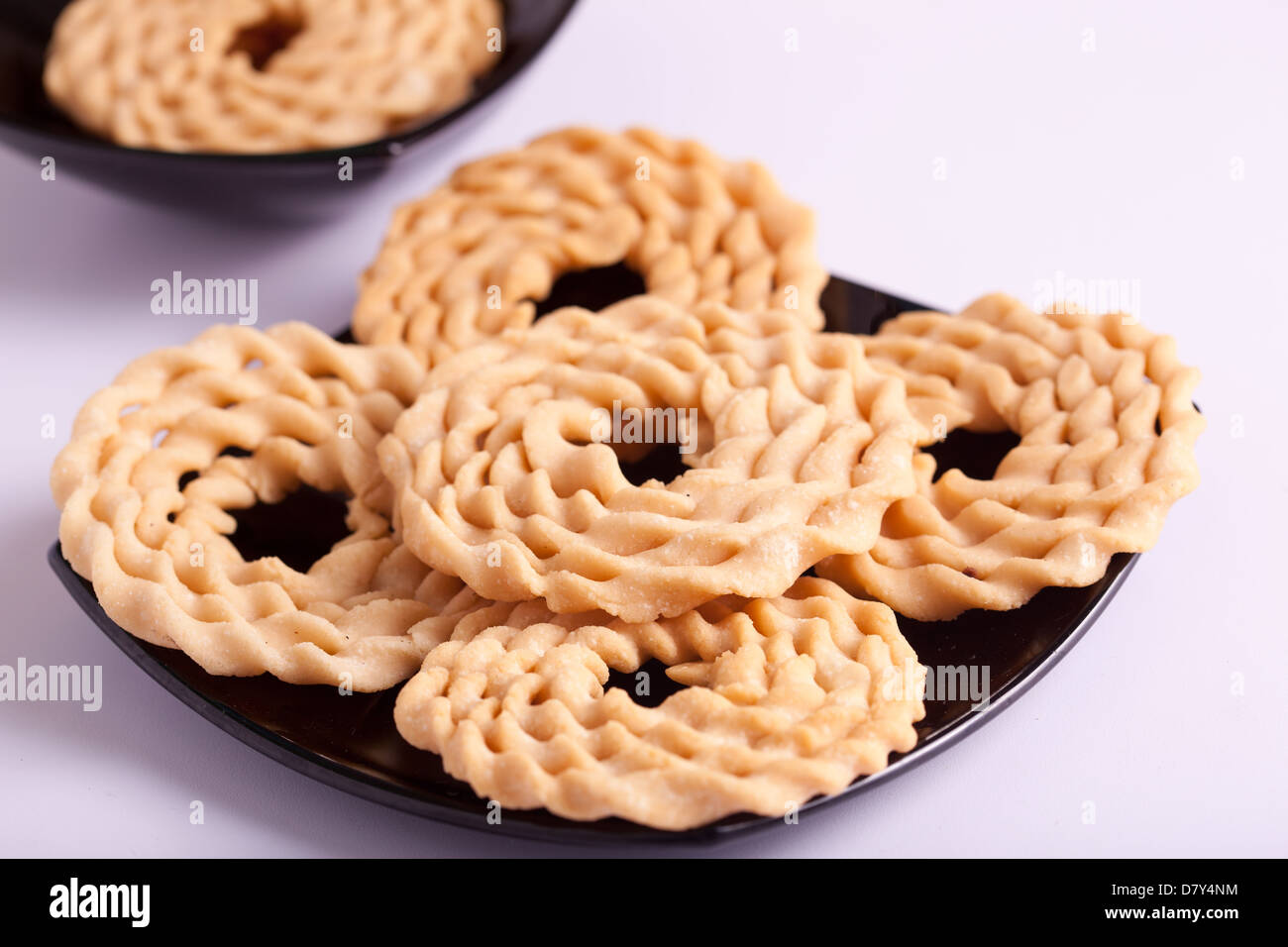 Murukku is a savoury snack popular in South India Stock Photo - Alamy