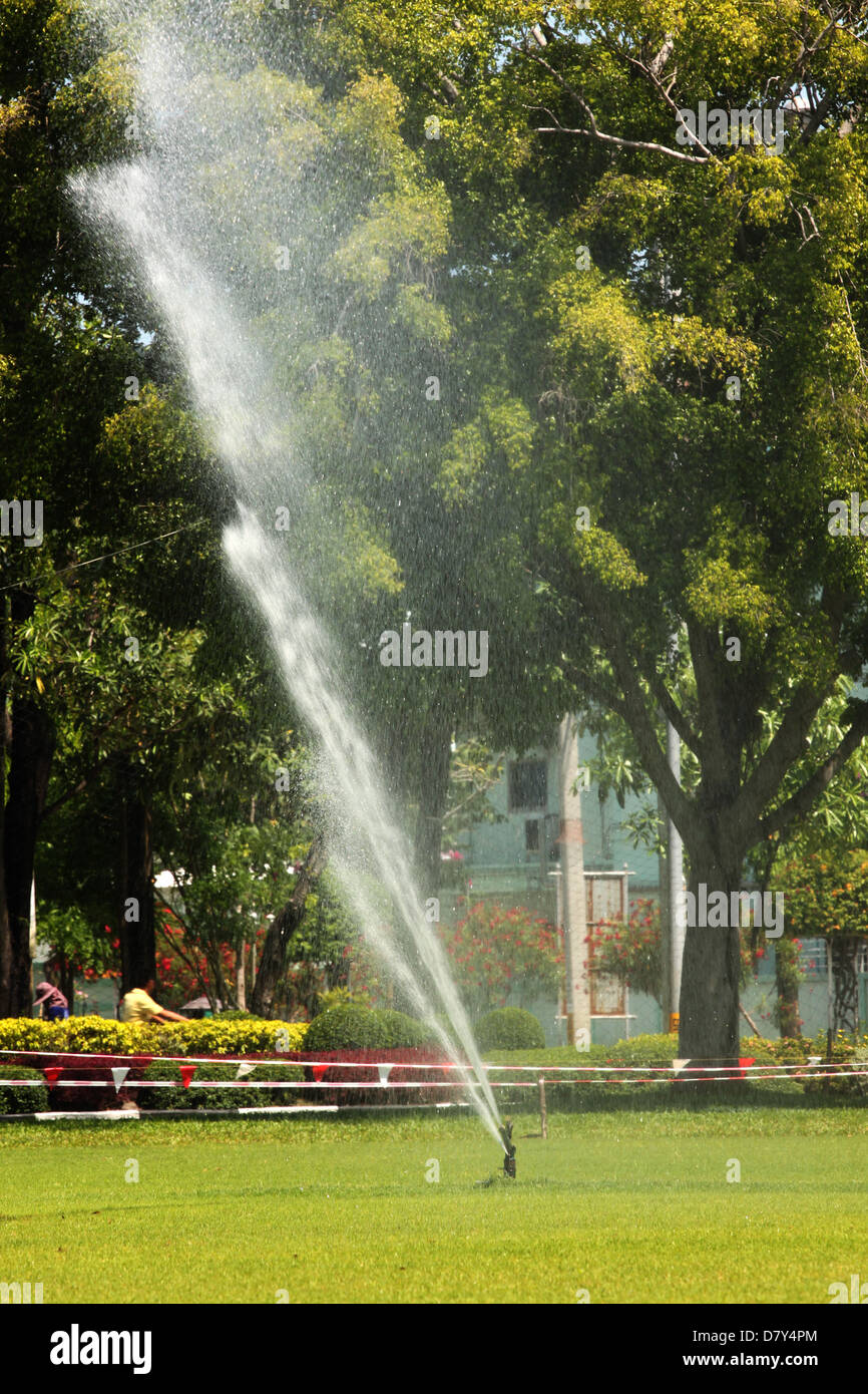 Sprinkler was in the lawn water injection Stock Photo - Alamy