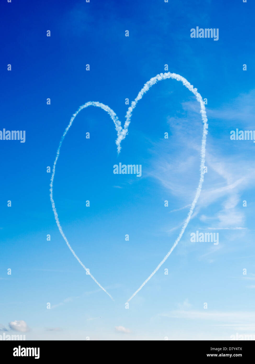 Heart shape made from Red arrows jet vapor trail in the sky over ...