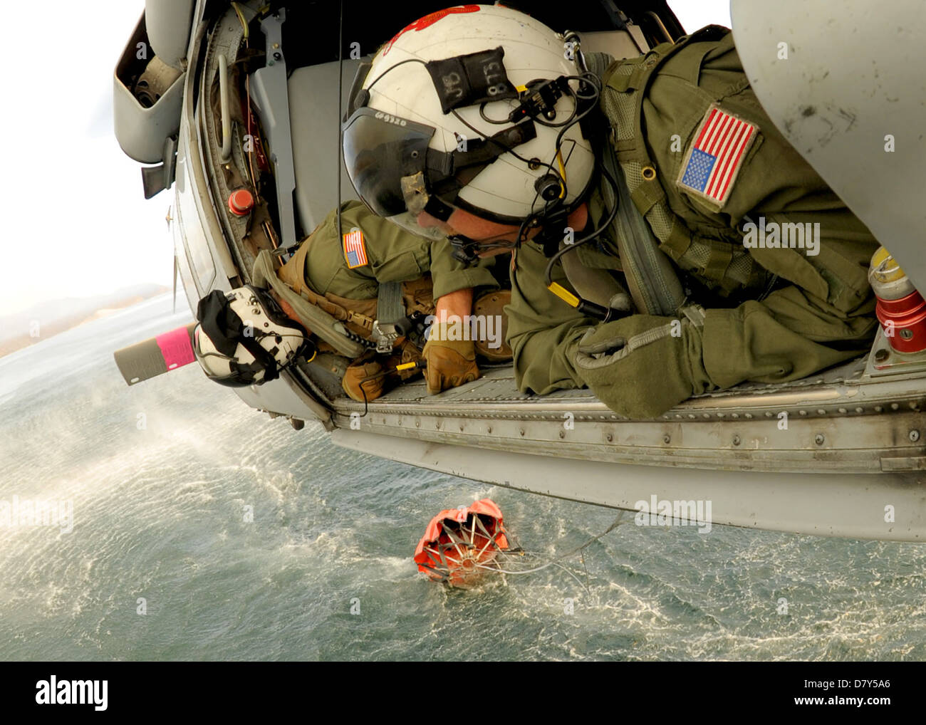 Sailors fill a Bambi bucket Stock Photo - Alamy