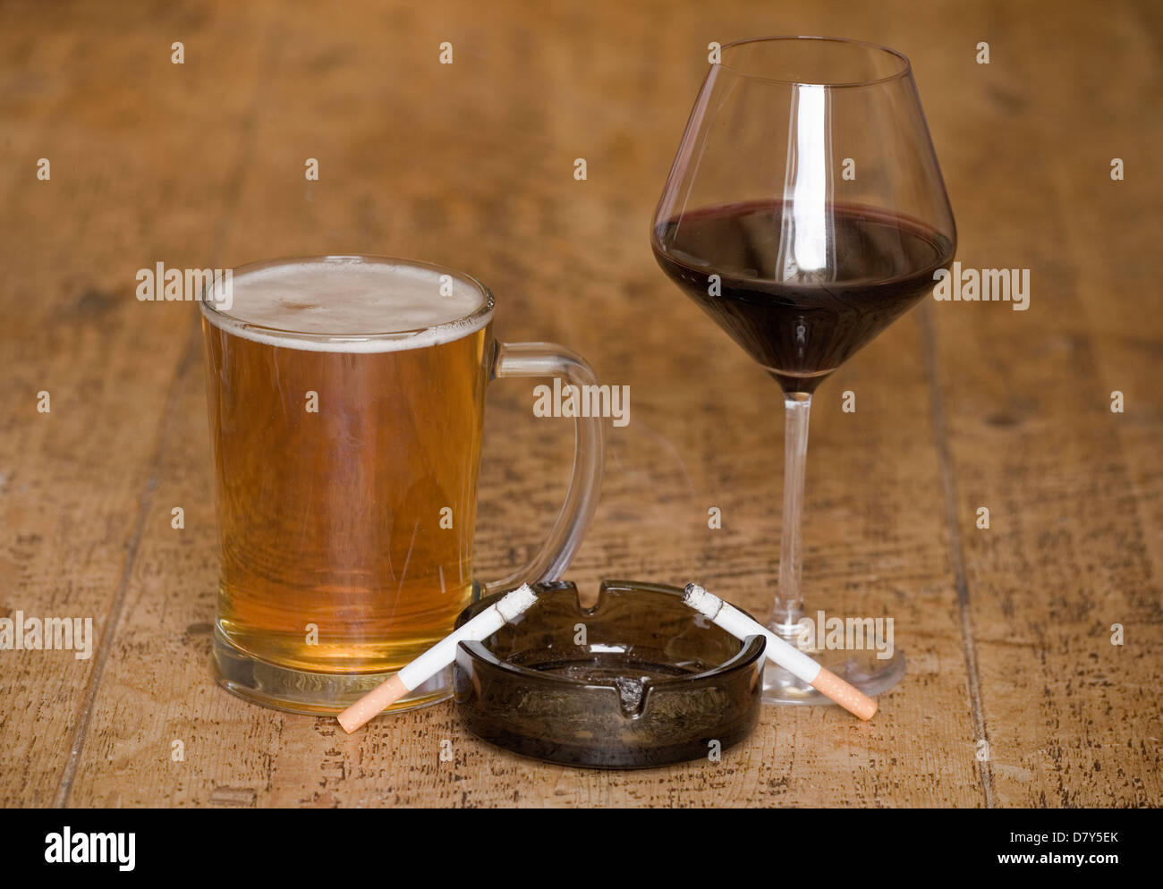 Cigarettes and alcohol on a table Stock Photo - Alamy