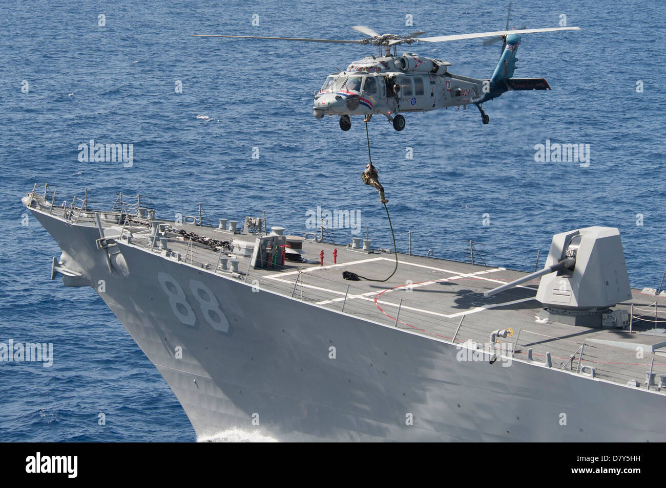 A Sailor conducts a fast-rope exercise at sea Stock Photo - Alamy