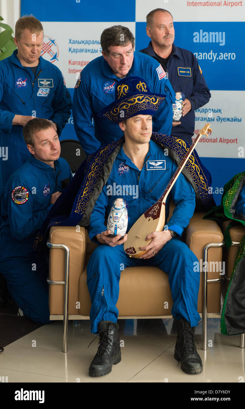 NASA astronaut Tom Marshburn with gifts of traditional Kazakhstan dress ...