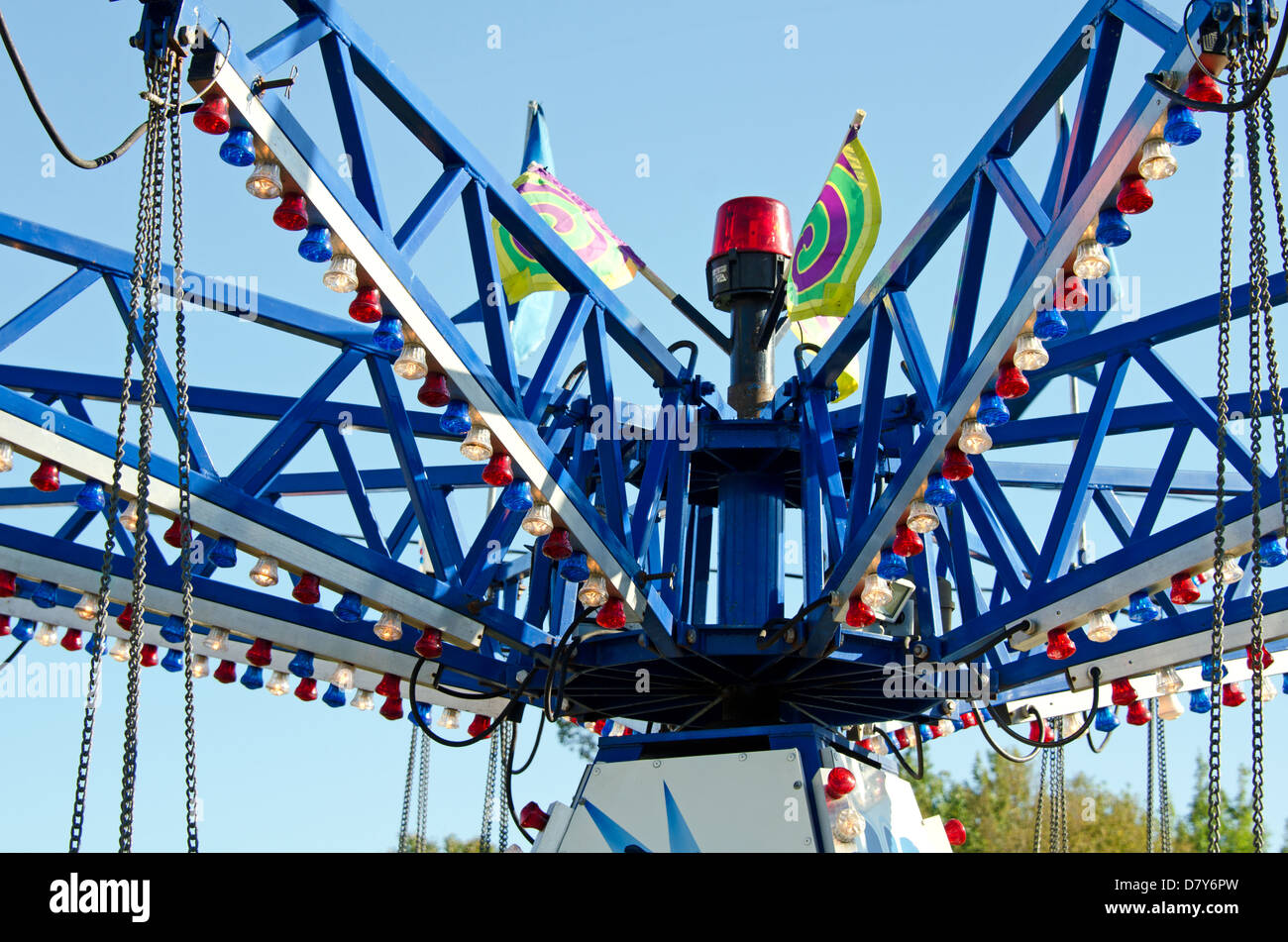 The central mechanism of a swings ride at a carnival or fun fair Stock ...