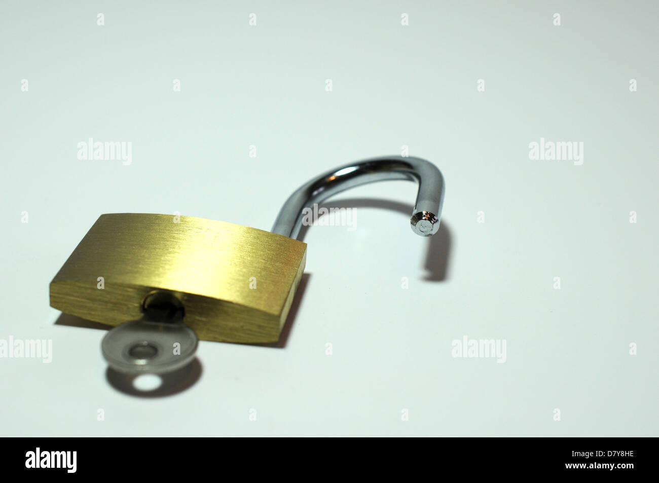 Closeup of padlock and key Stock Photo - Alamy