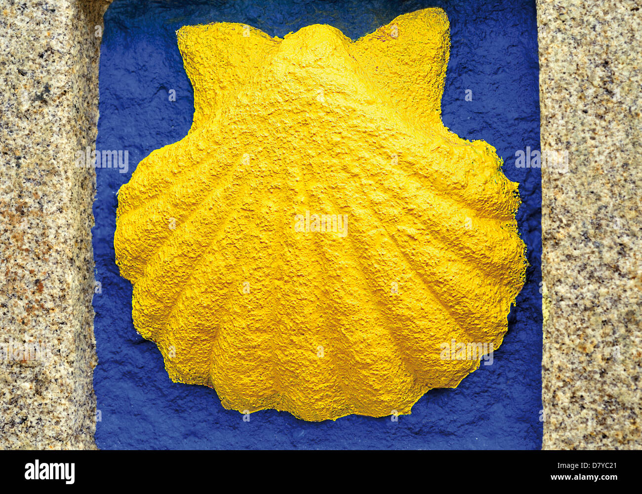 Spain, Galicia: Way stone with yellow shell on blue background as a ...