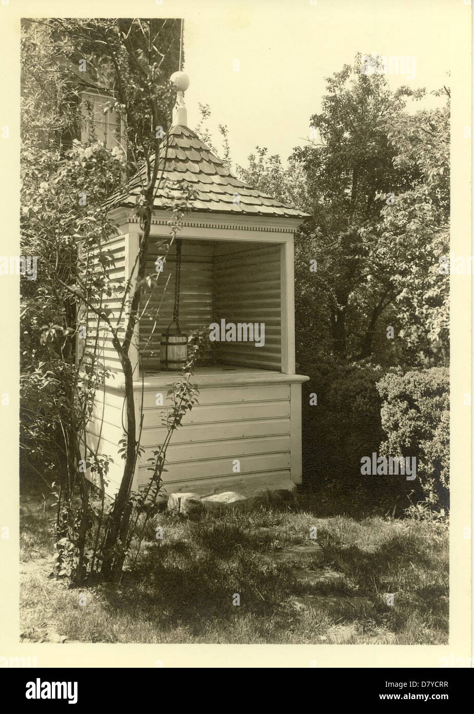 A photograph of the Manse Well, an important historical building or ...