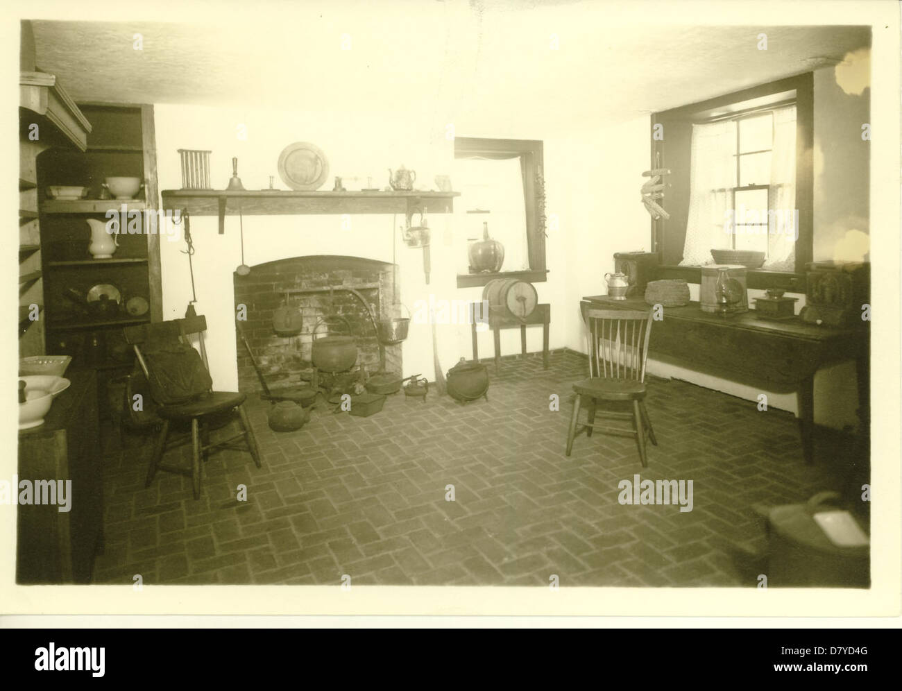 A photograph of a historic kitchen, possibly from the early 20th ...