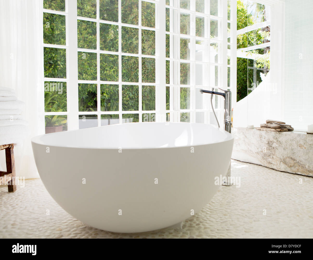 Bathtub in modern bathroom Stock Photo - Alamy