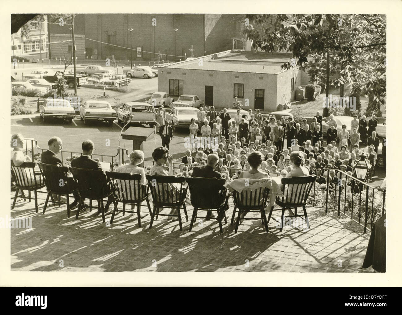This photograph captures the dedication of a garden terrace, likely a ...