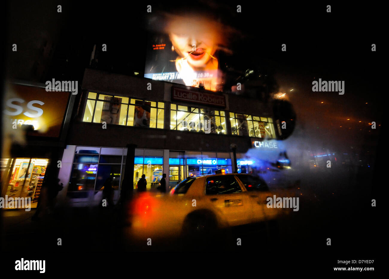 A creative photograph of New York (Manhattan) at night taken through a ...