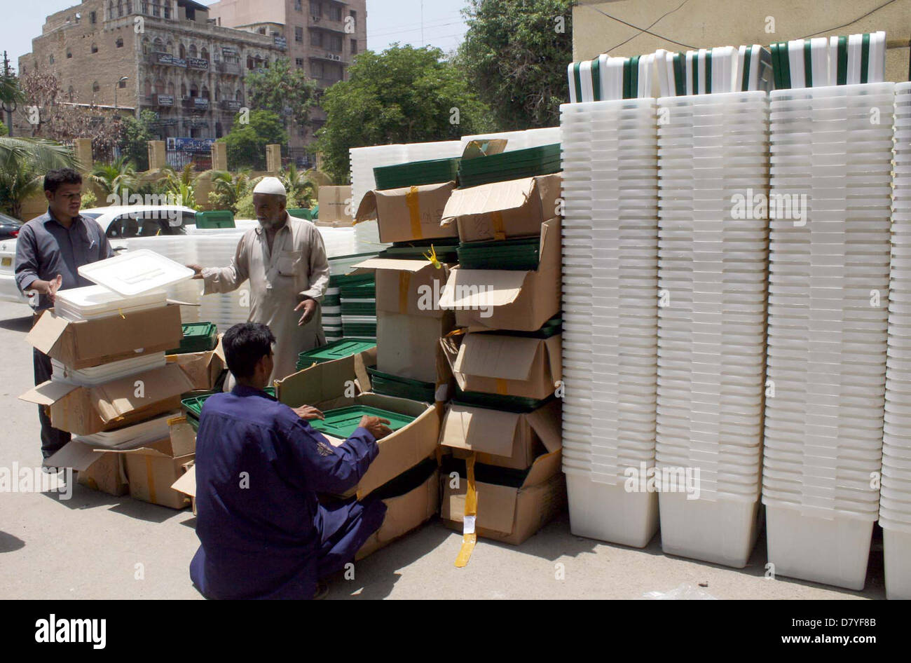 Election Commission officials busy in packing of ballot boxes for ...
