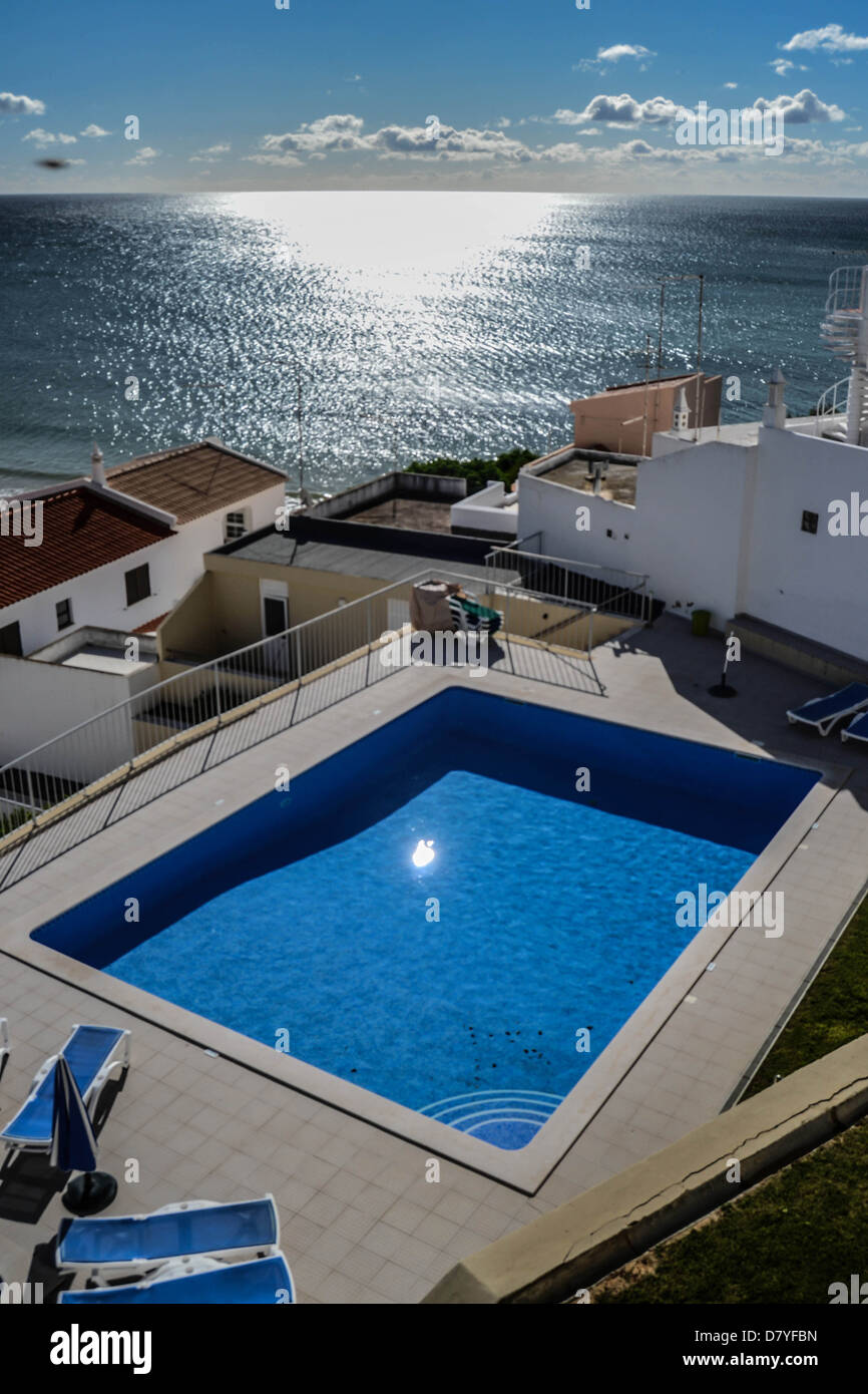 Shot of an swimming pool over the ocean Stock Photo - Alamy