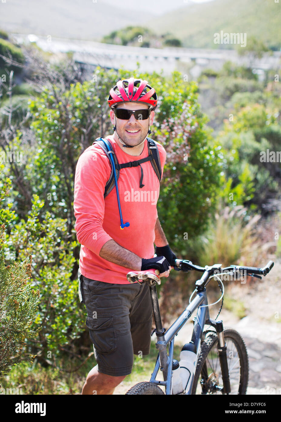 Person getting on bike and path hi-res stock photography and images - Alamy