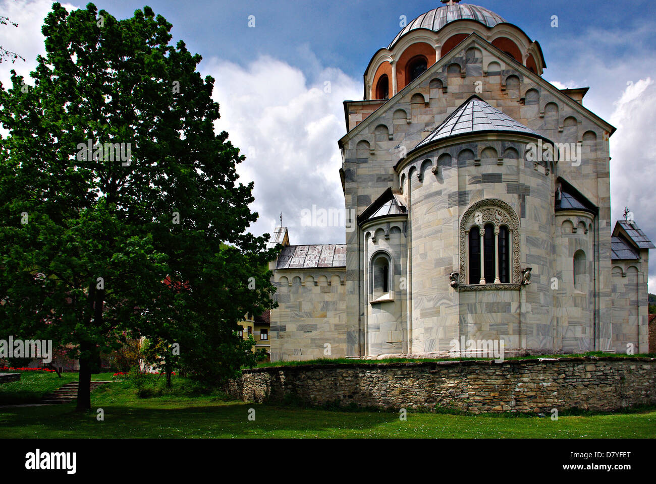 The most famous Serbian monastery with beautiful park and flowers at ...