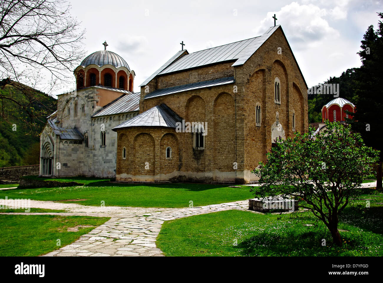 The most famous Serbian monastery with beautiful park and flowers at ...