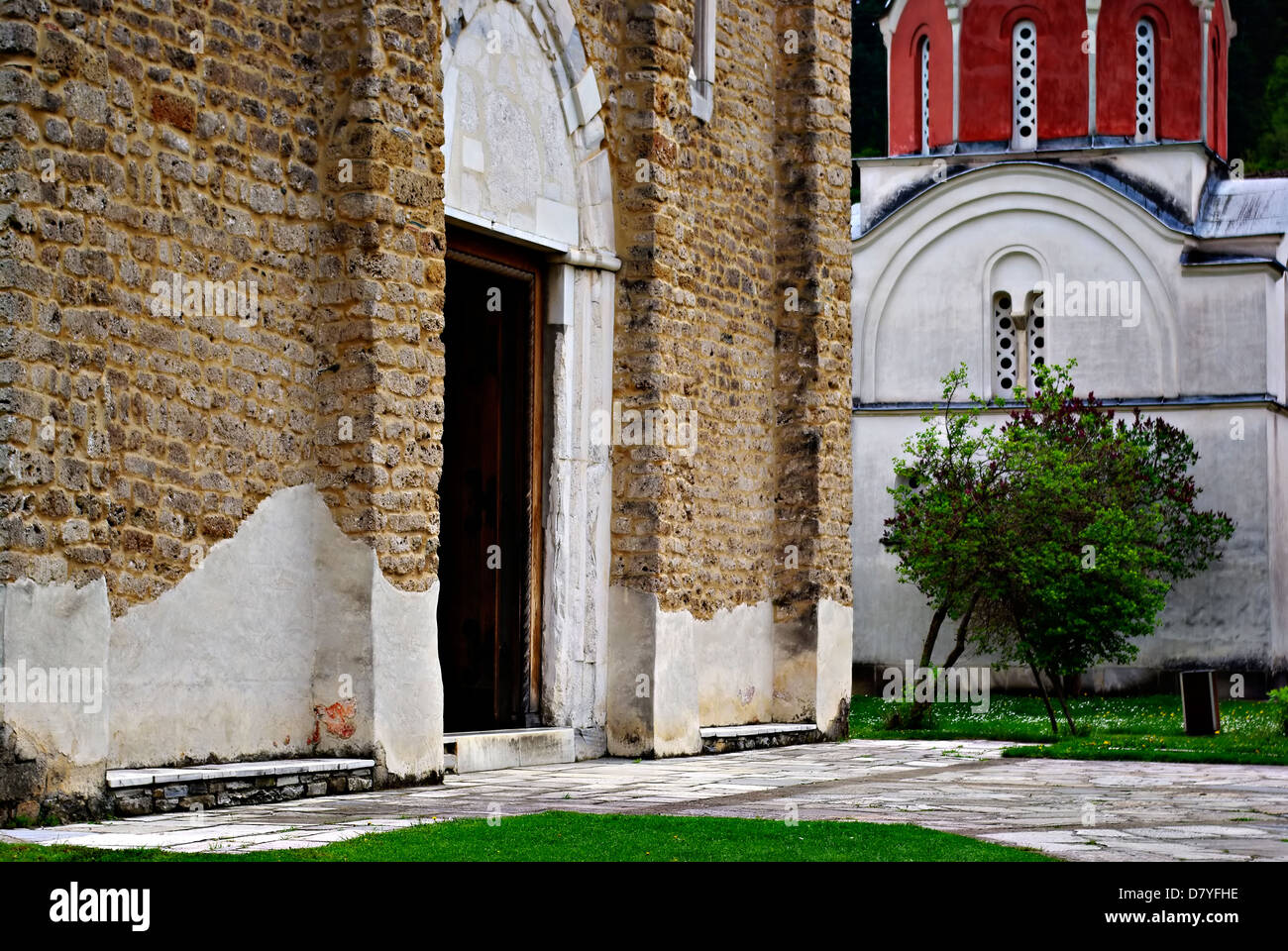 The most famous Serbian monastery with beautiful park and flowers at ...