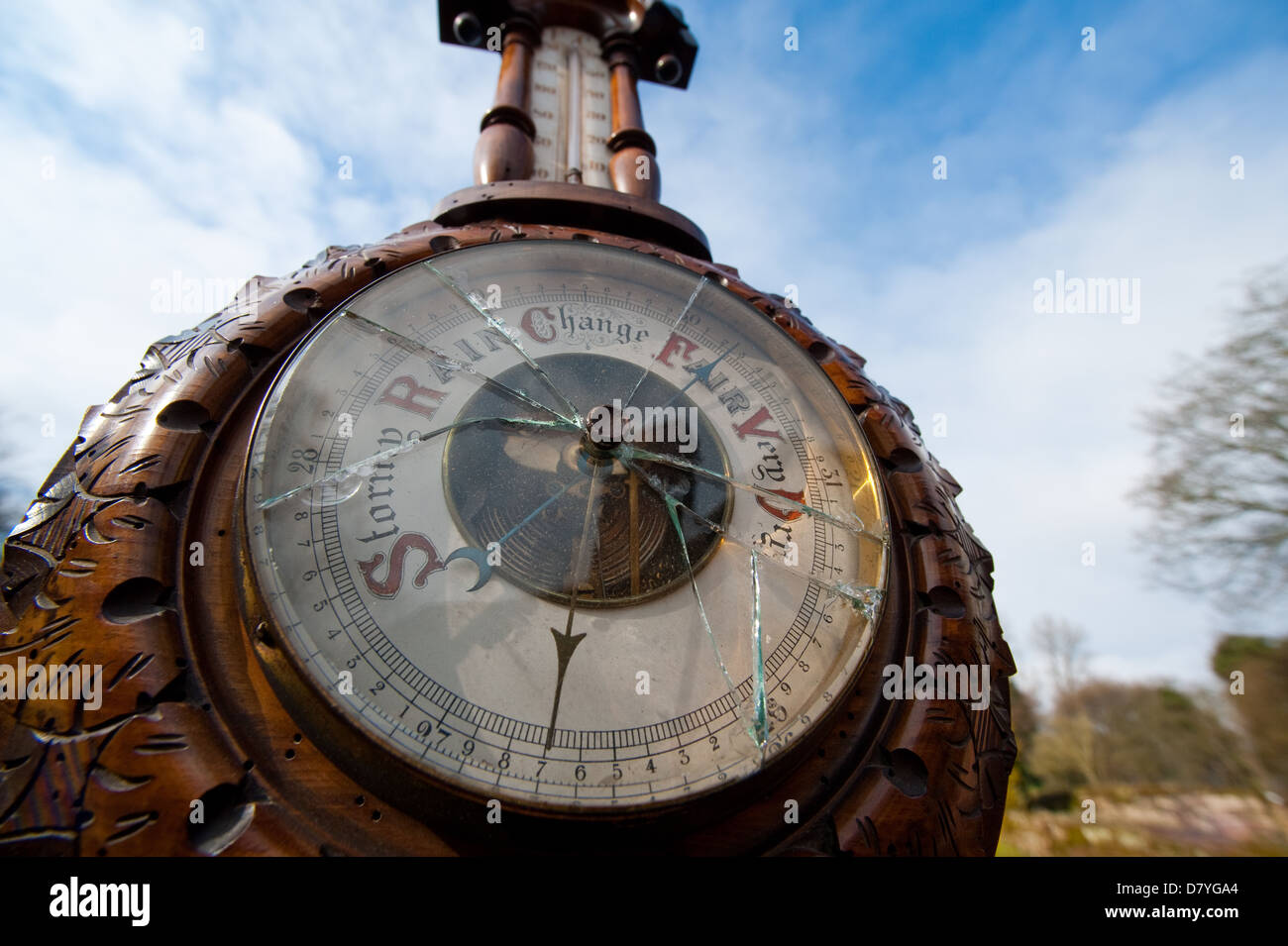 A broken barometer against a blue sky Stock Photo - Alamy