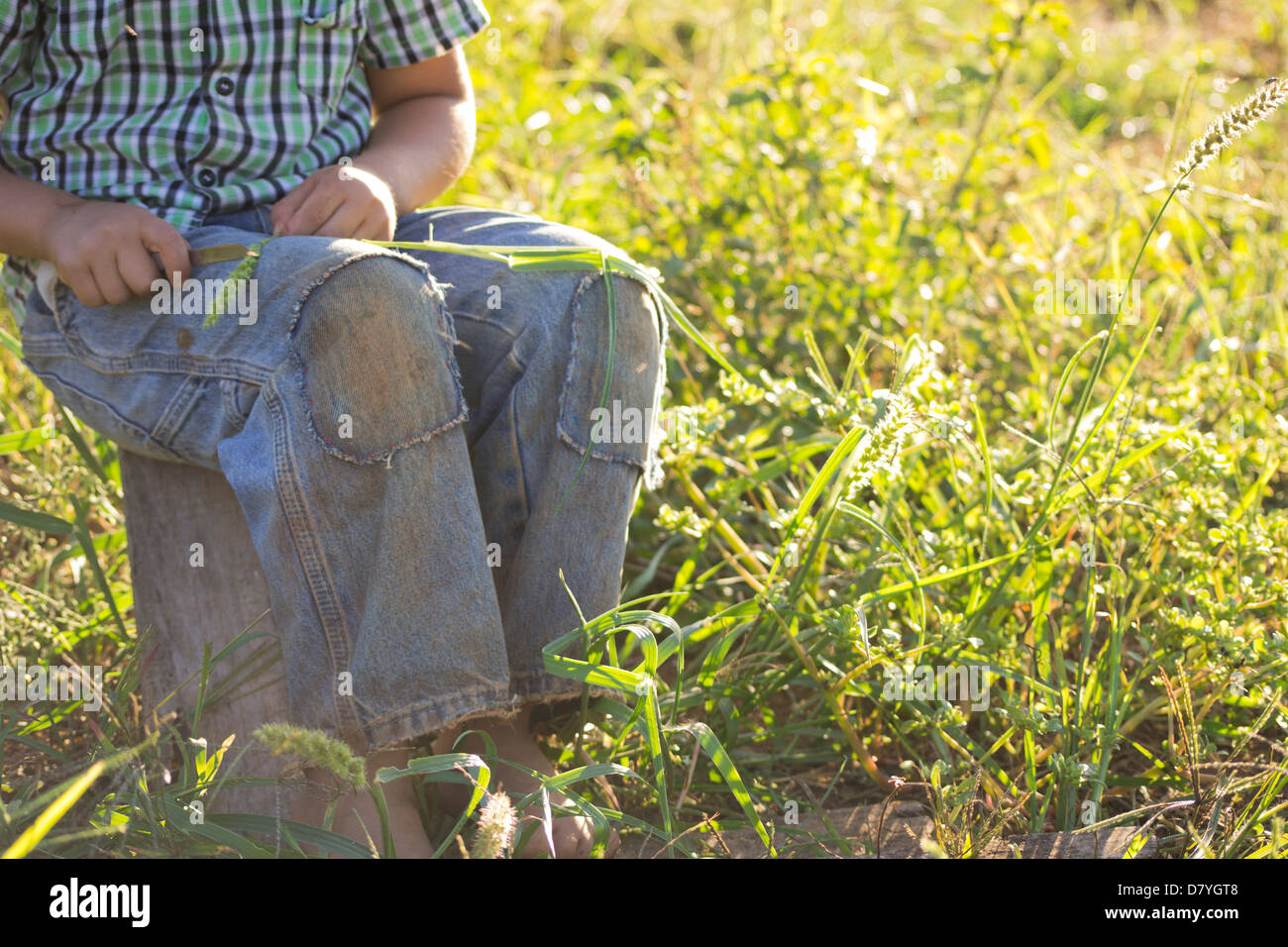 Boy in sun hi-res stock photography and images - Alamy