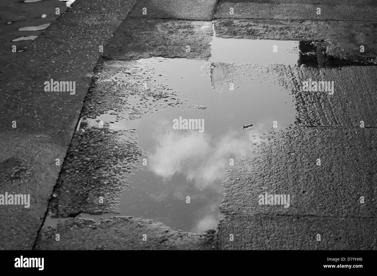 Puddle paving pavement hi-res stock photography and images - Alamy
