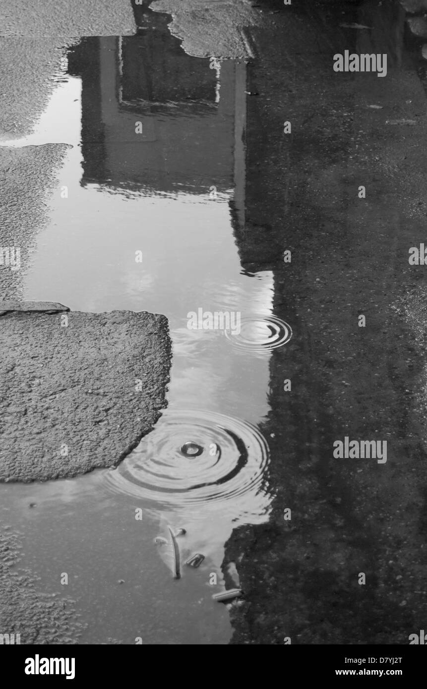 Puddle splash Black and White Stock Photos & Images - Alamy