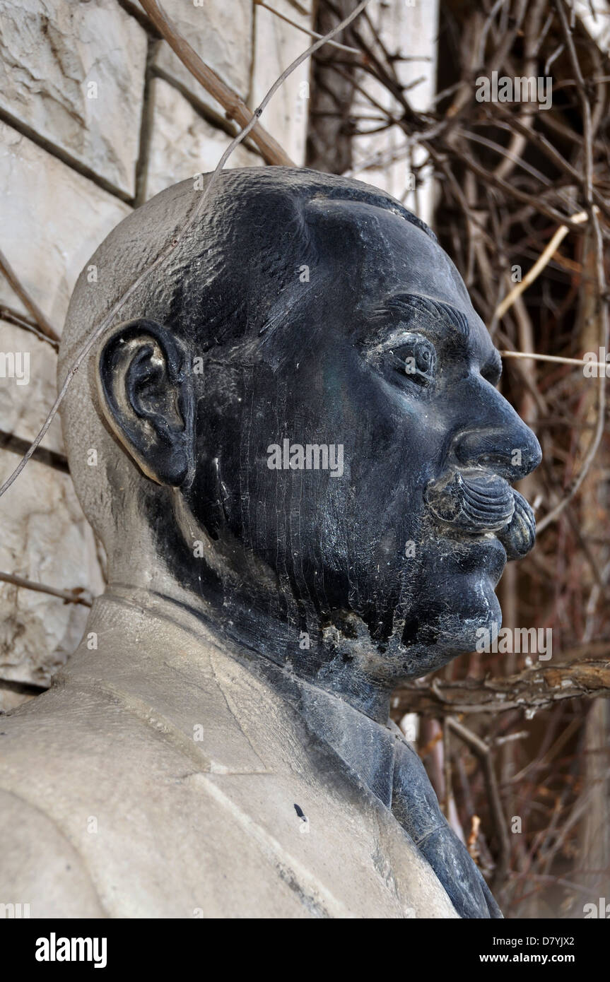 Vandalized marble statue of unidentified man with mustache at the ...