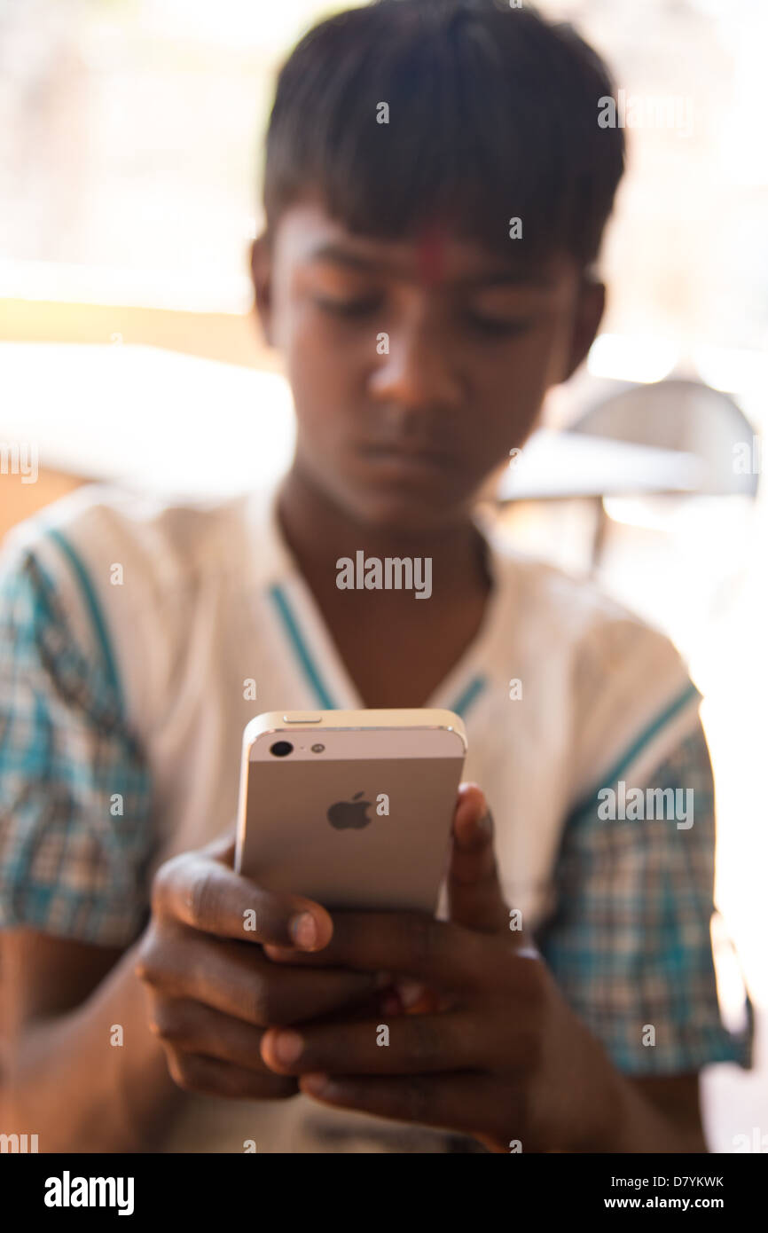 Indian boy and iphone hi-res stock photography and images - Alamy