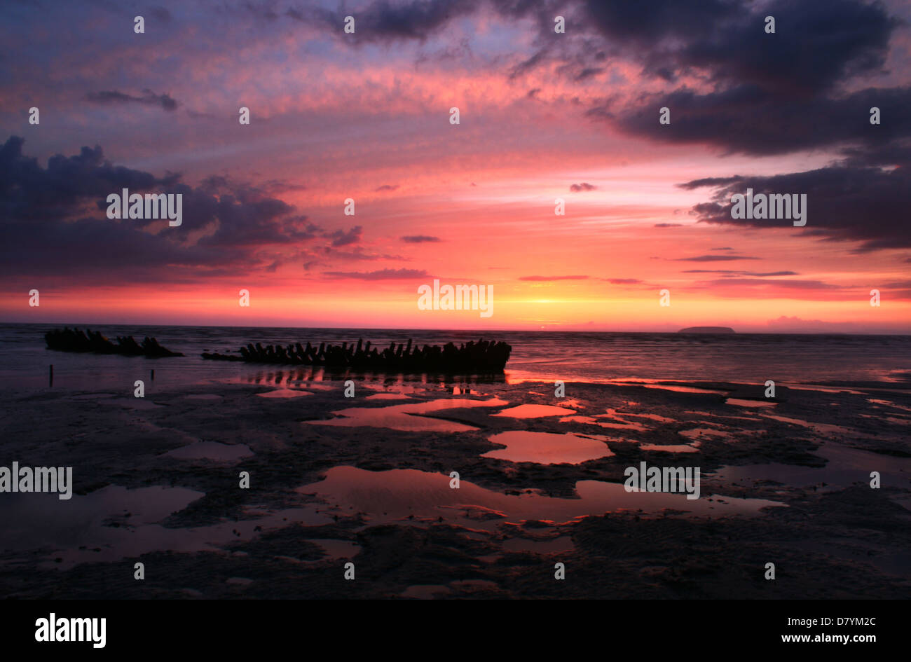 Sunset over the Berrow Ship Wreck (formerly the SS Nornen) at Brean ...