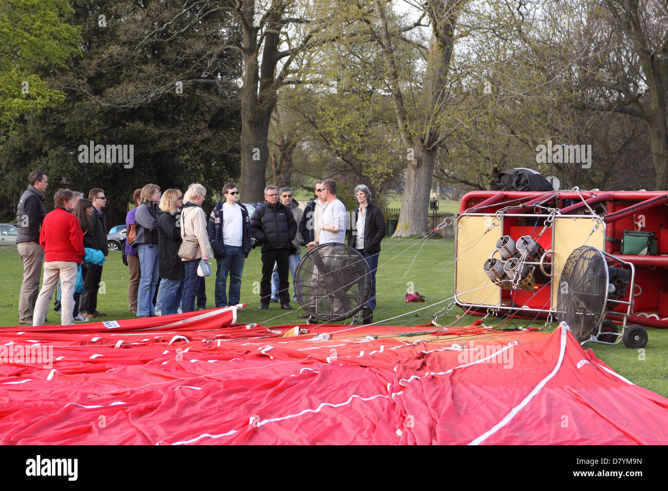 Hot air balloon passengers receive a pre flight safety briefing whilst ...