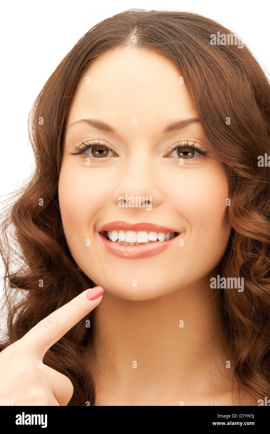 woman touching her chin Stock Photo - Alamy