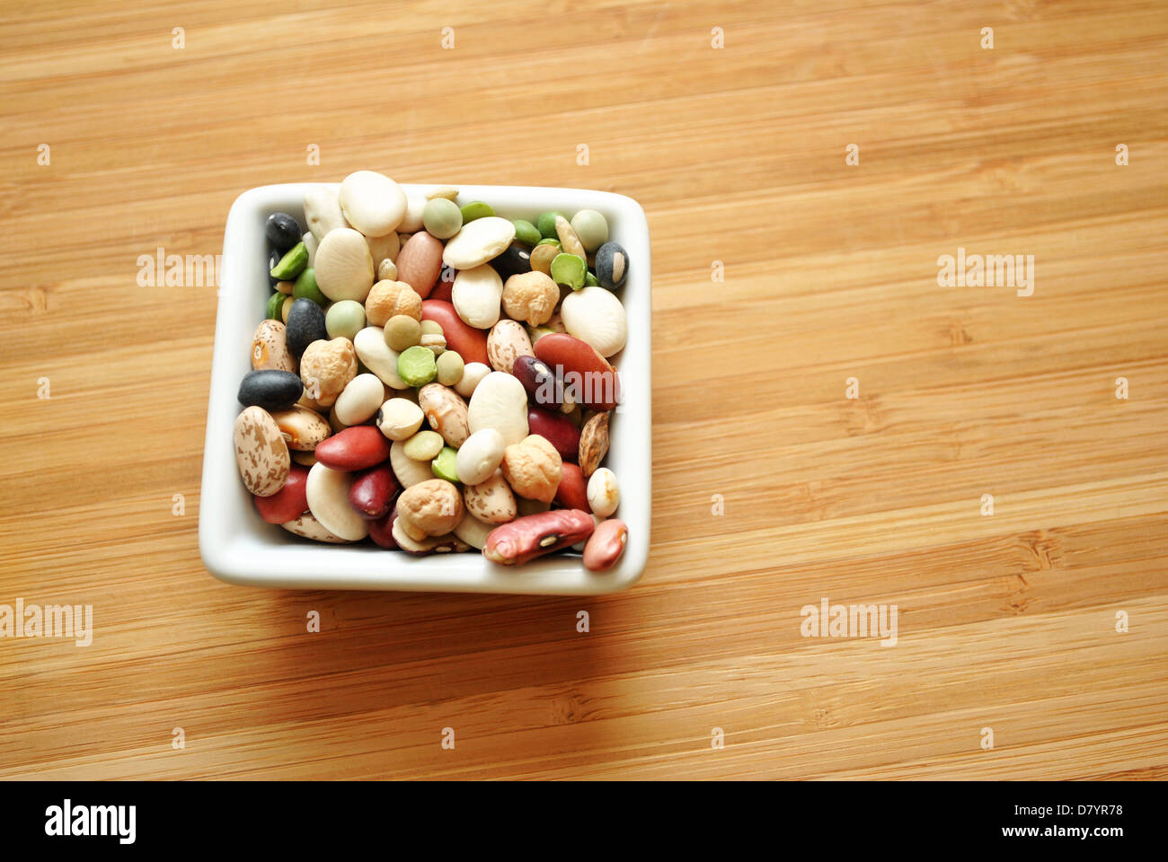 Different Dried Beans in a White Square Bowl Stock Photo - Alamy