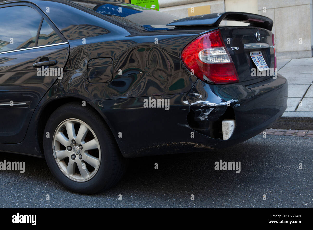 Rear bumper damage on Toyota Camry - USA Stock Photo - Alamy