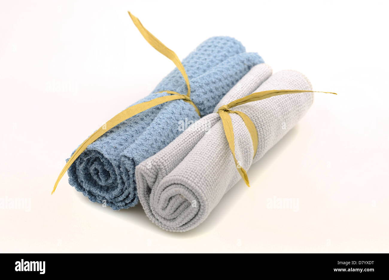 Wash cloths rolled up for spa treatment on white background Stock Photo ...